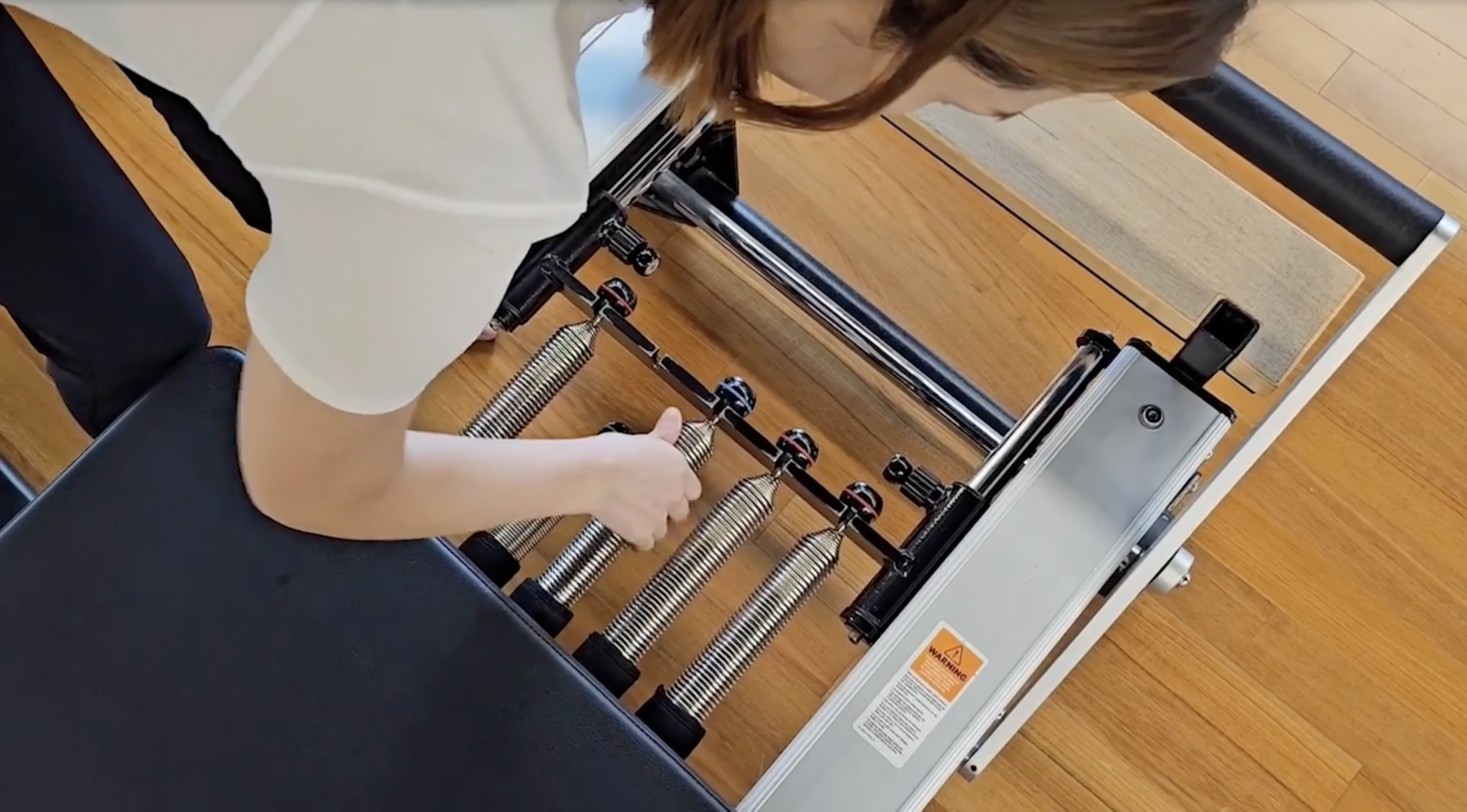 Exercise of the Month: Thigh Stretch on the Reformer - F1 RECREATION